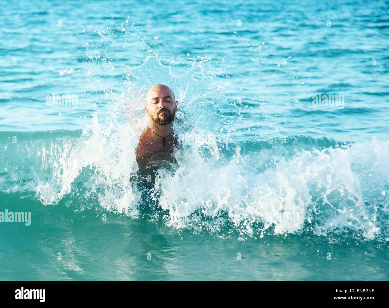 Guy playing on the waves Stock Photo - Alamy