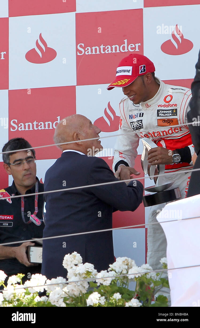 Lewis Hamilton shaking hands with Sterling Moss at the British Formula ...