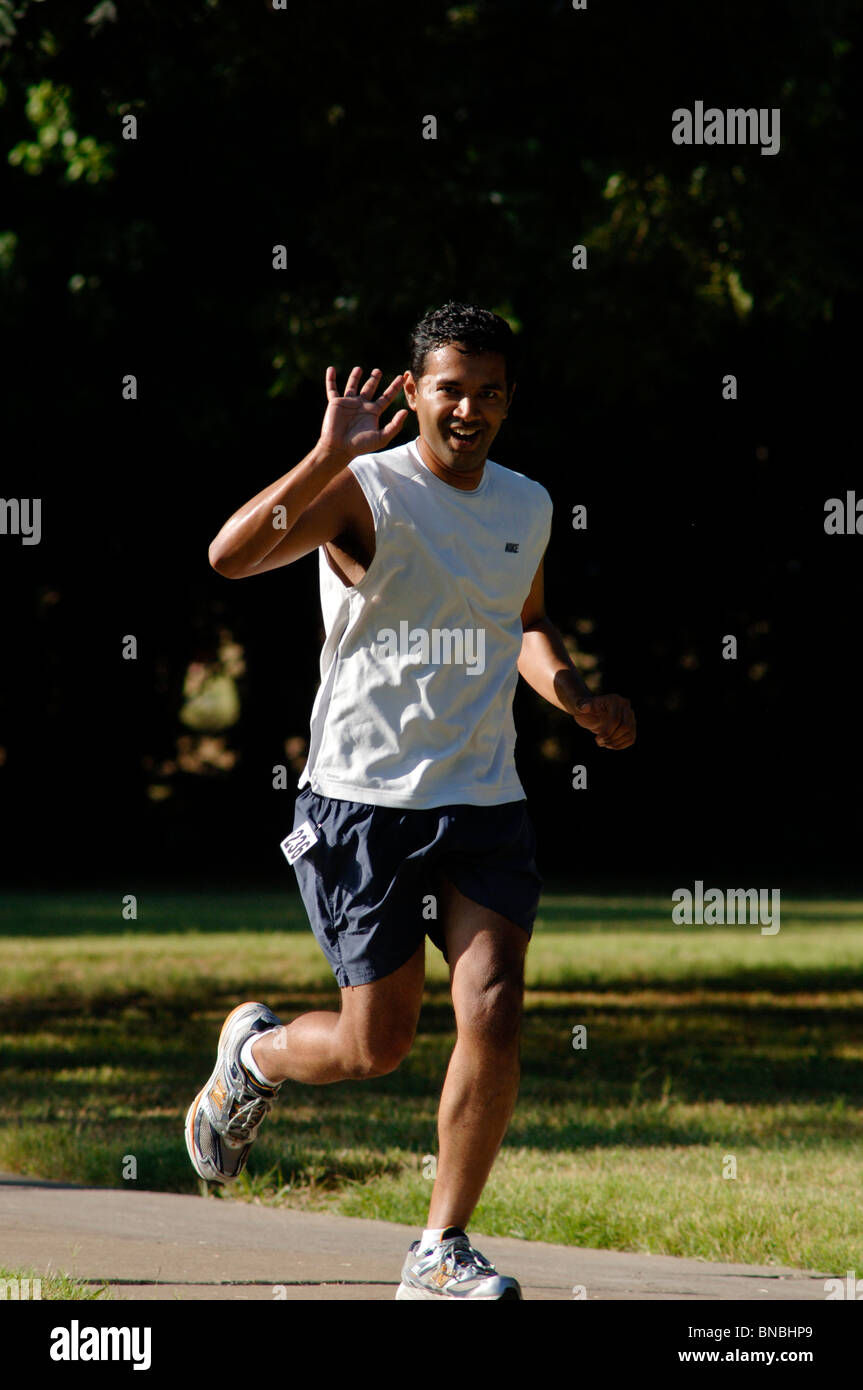 Male and female Marathon runners and joggers of all ages, shapes, sizes ...