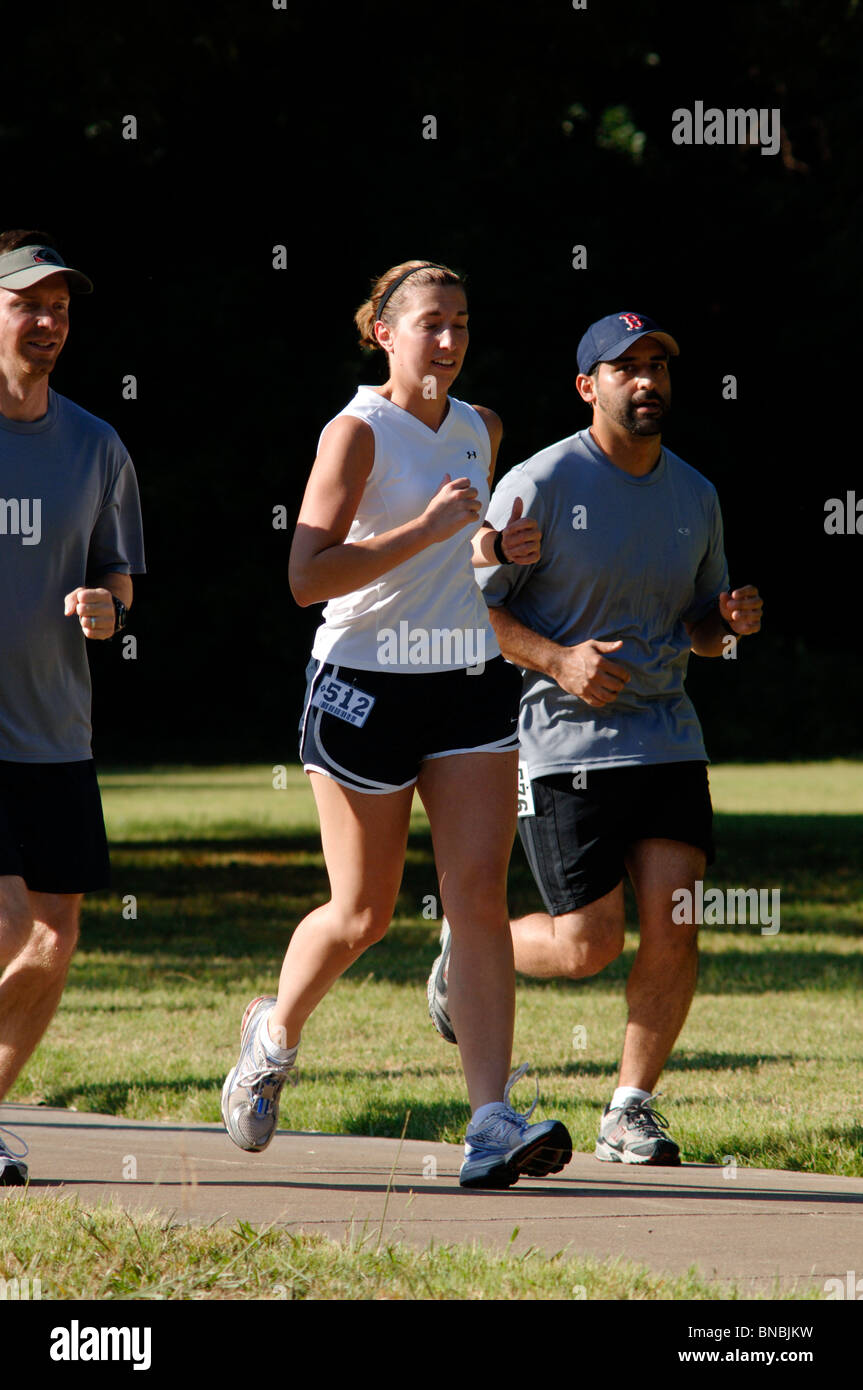 Male and female Marathon runners and joggers of all ages, shapes, sizes ...