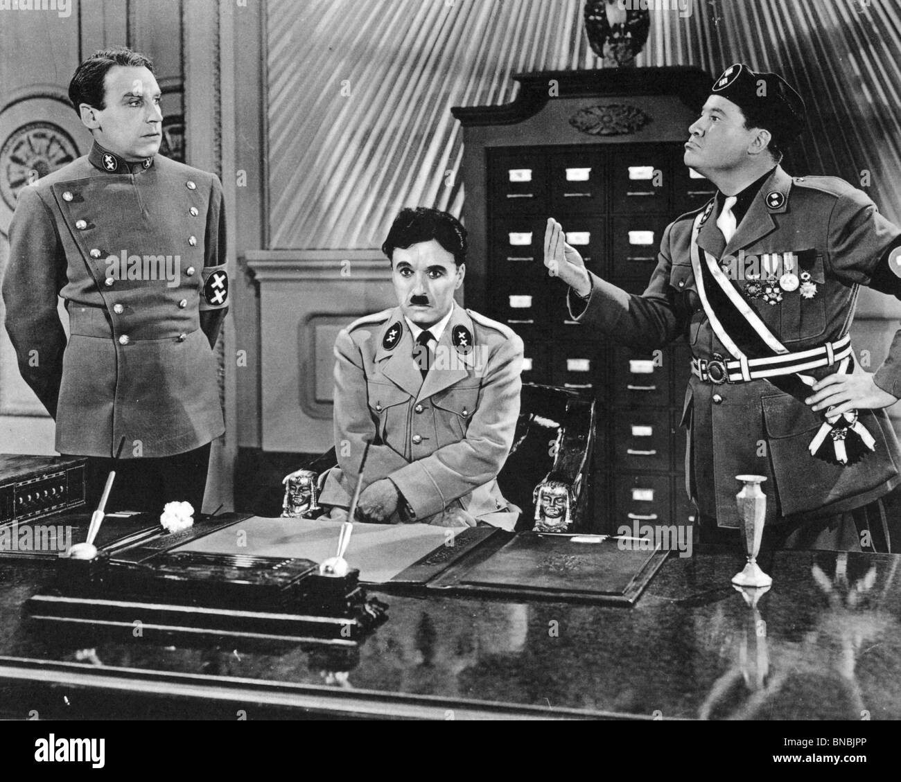 THE GREAT DICTATOR 1940 United Artists film with Charlie Chaplin seated ...