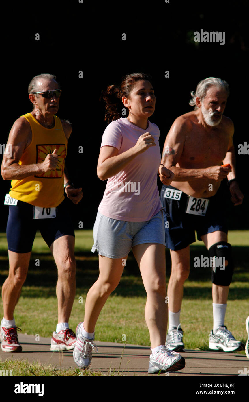 Male and female Marathon runners and joggers of all ages, shapes, sizes ...