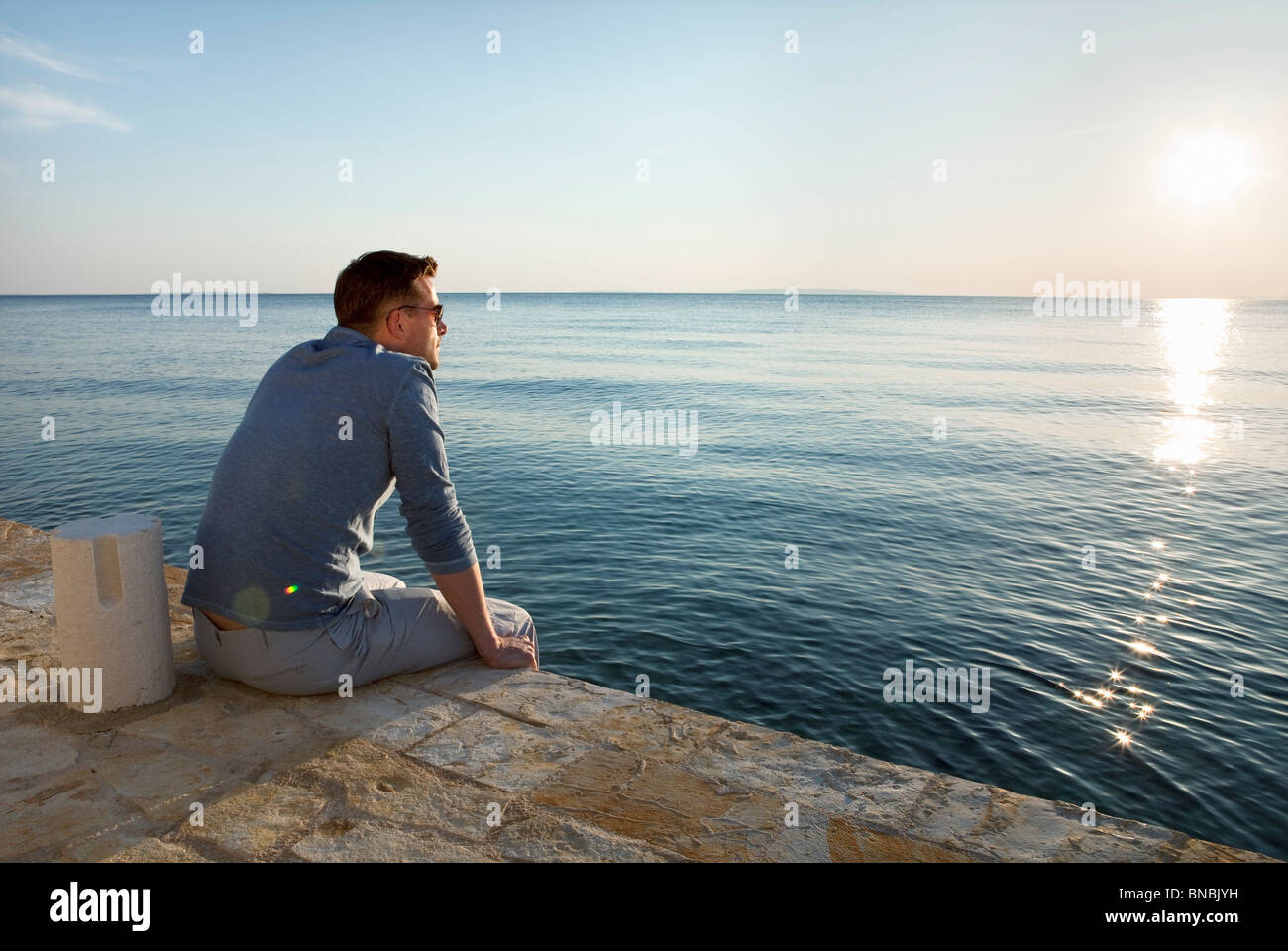 Man at sea Stock Photo - Alamy