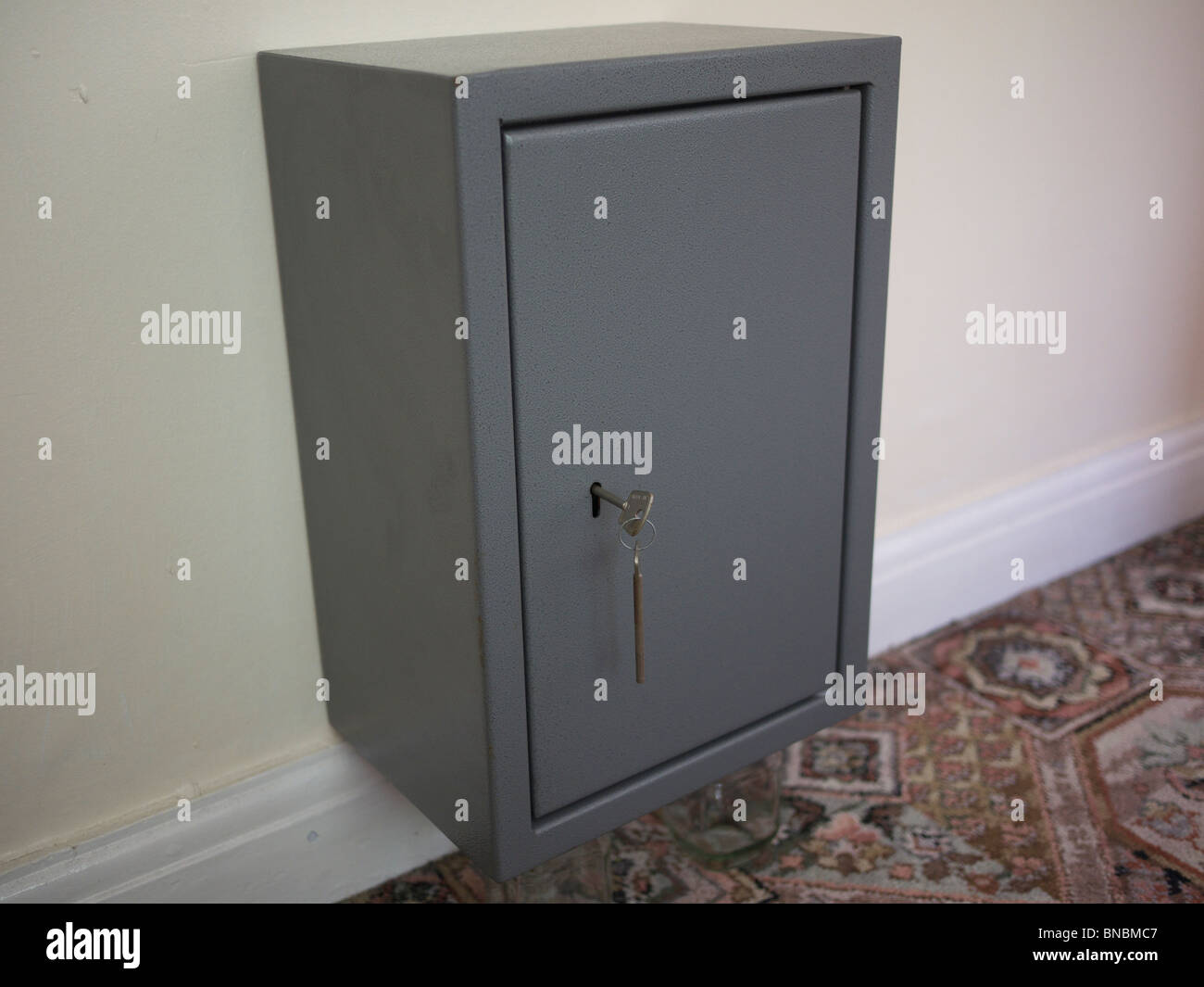 Steel cabinet home safe with key locks Stock Photo - Alamy