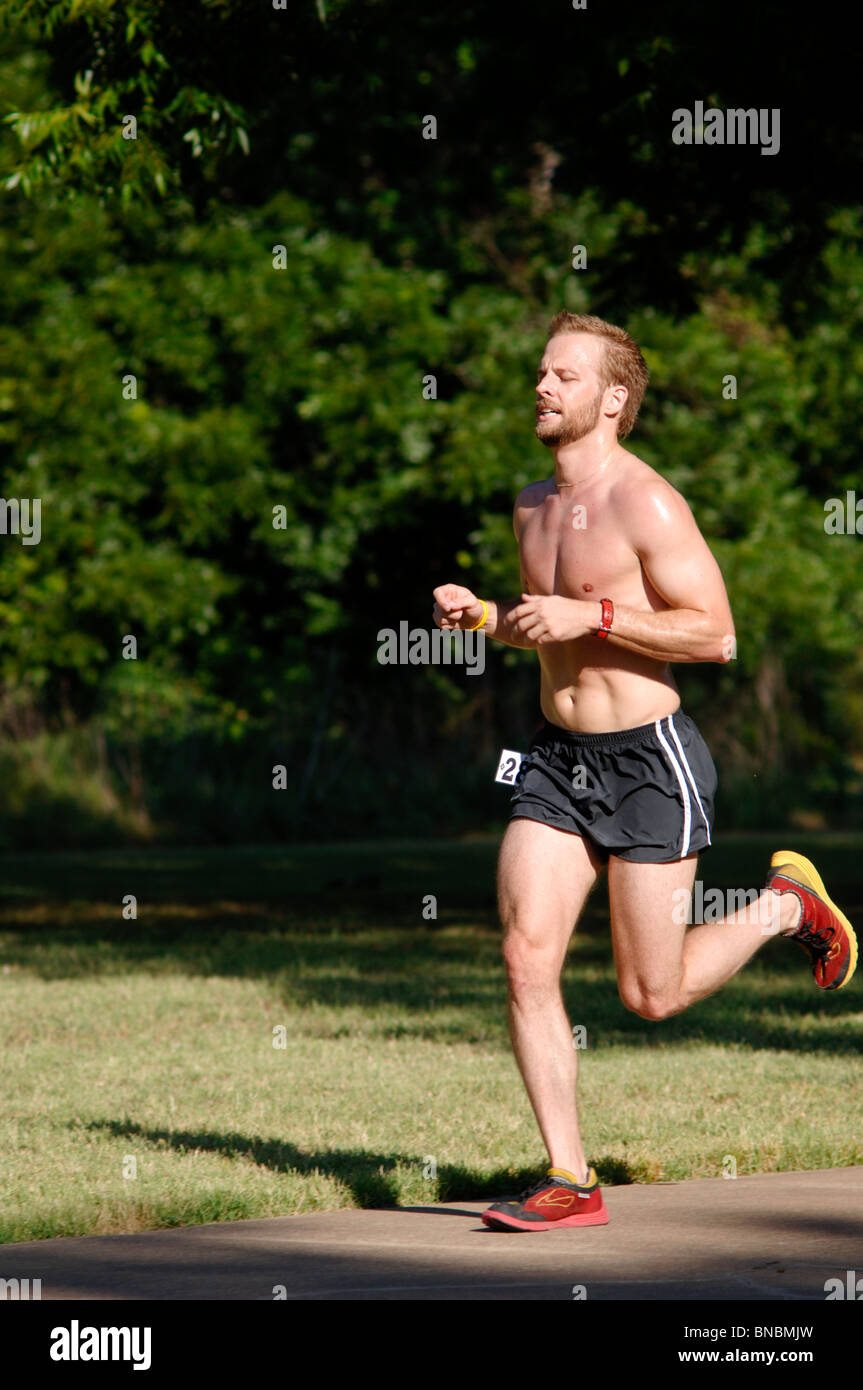 Male and female Marathon runners and joggers of all ages, shapes, sizes ...