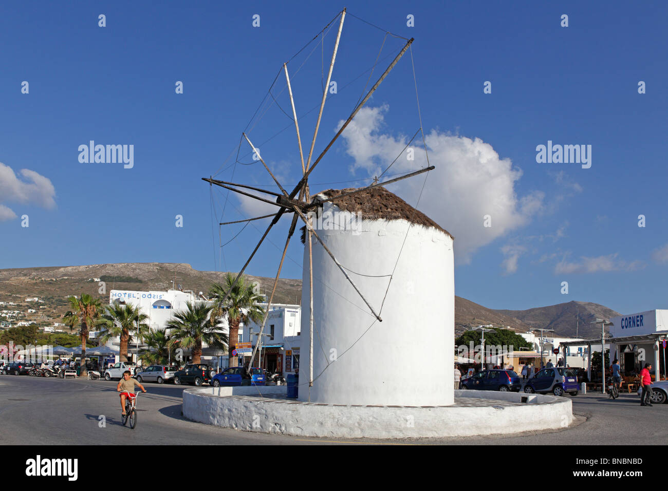 white windmill at the harbour of Parikia, Island of Paros, Cyclades ...