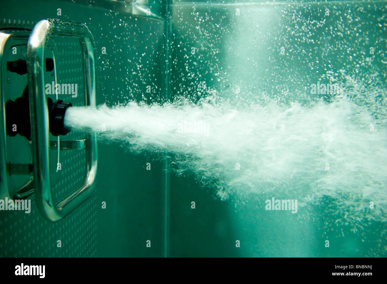 Underwater massage on swimming pool Stock Photo - Alamy