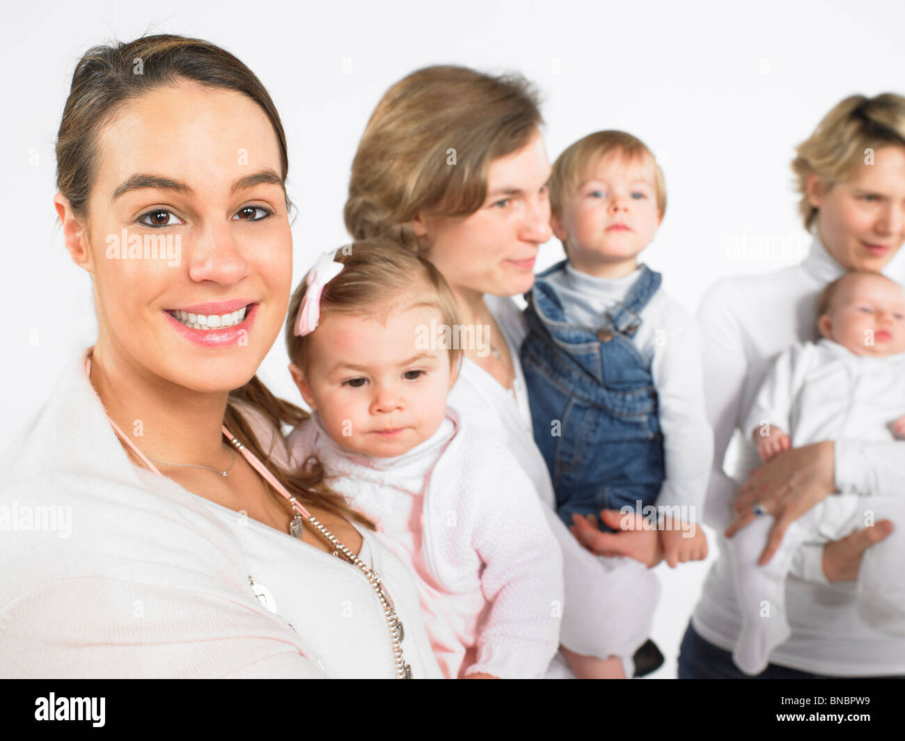 Group of mothers with babies Stock Photo - Alamy