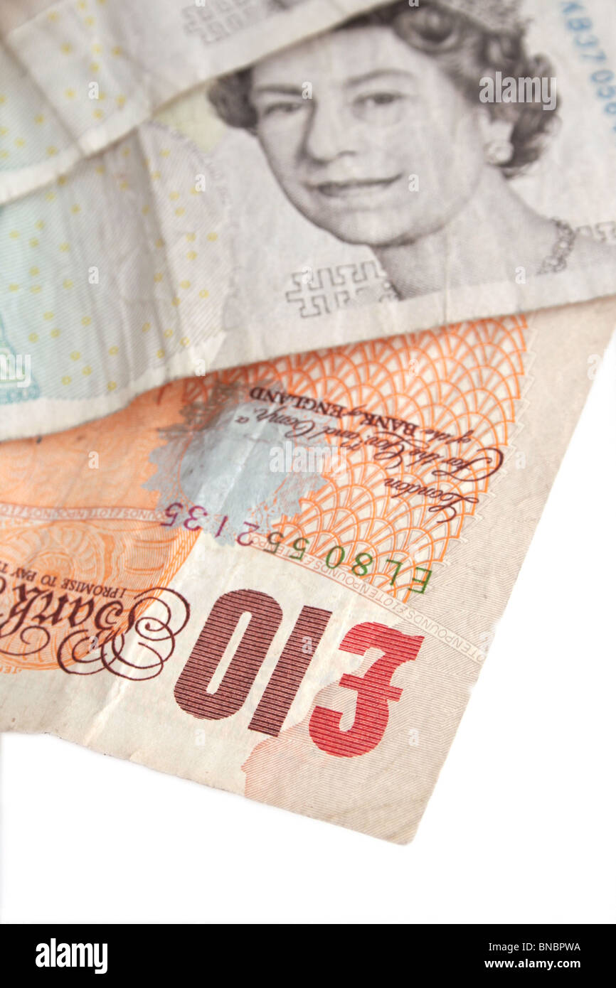 British bank notes, shot against white, on top of each other Stock ...