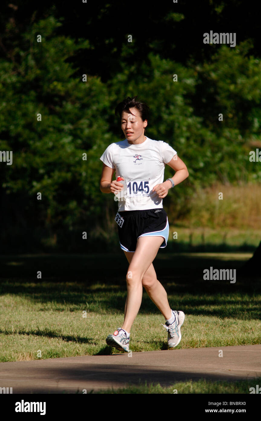 Male and female Marathon runners and joggers of all ages, shapes, sizes ...