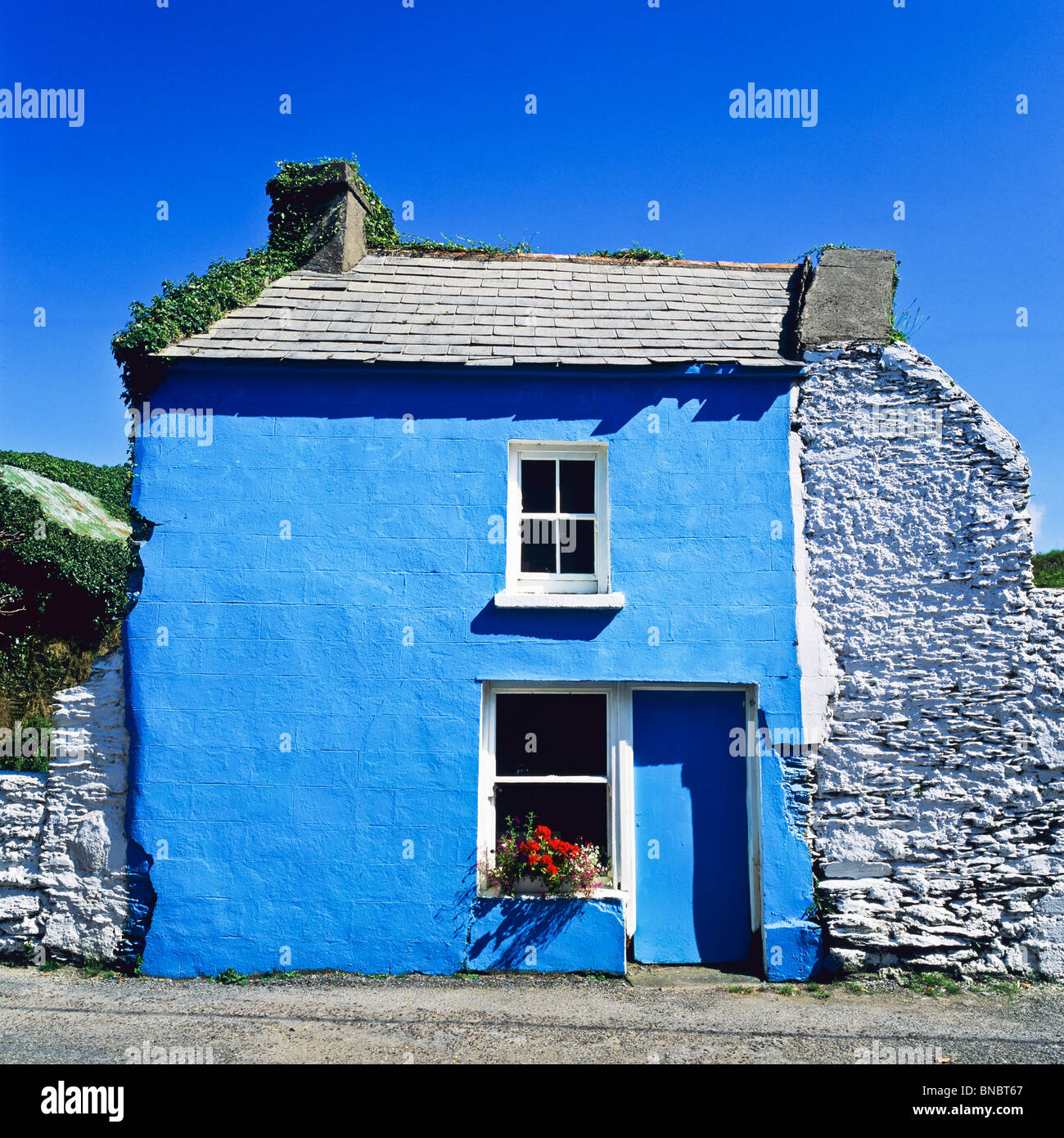 BLUE PAINTED HOUSE EYERIES BEARA PENINSULA COUNTY CORK IRELAND Stock ...