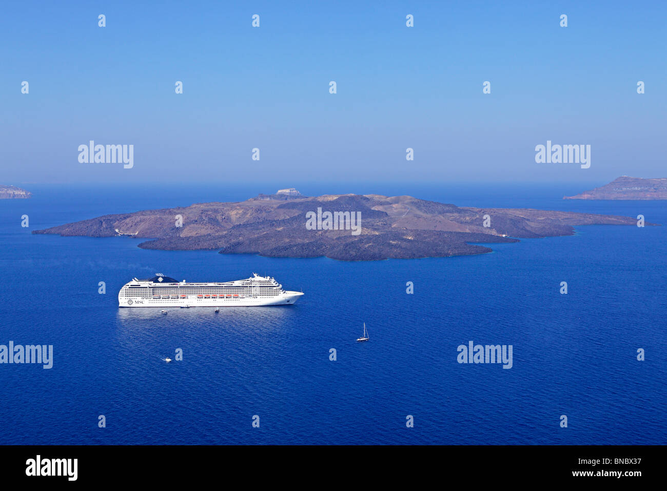 cruise liner anchoring off Santorini Island, Cyclades, Aegean Islands ...
