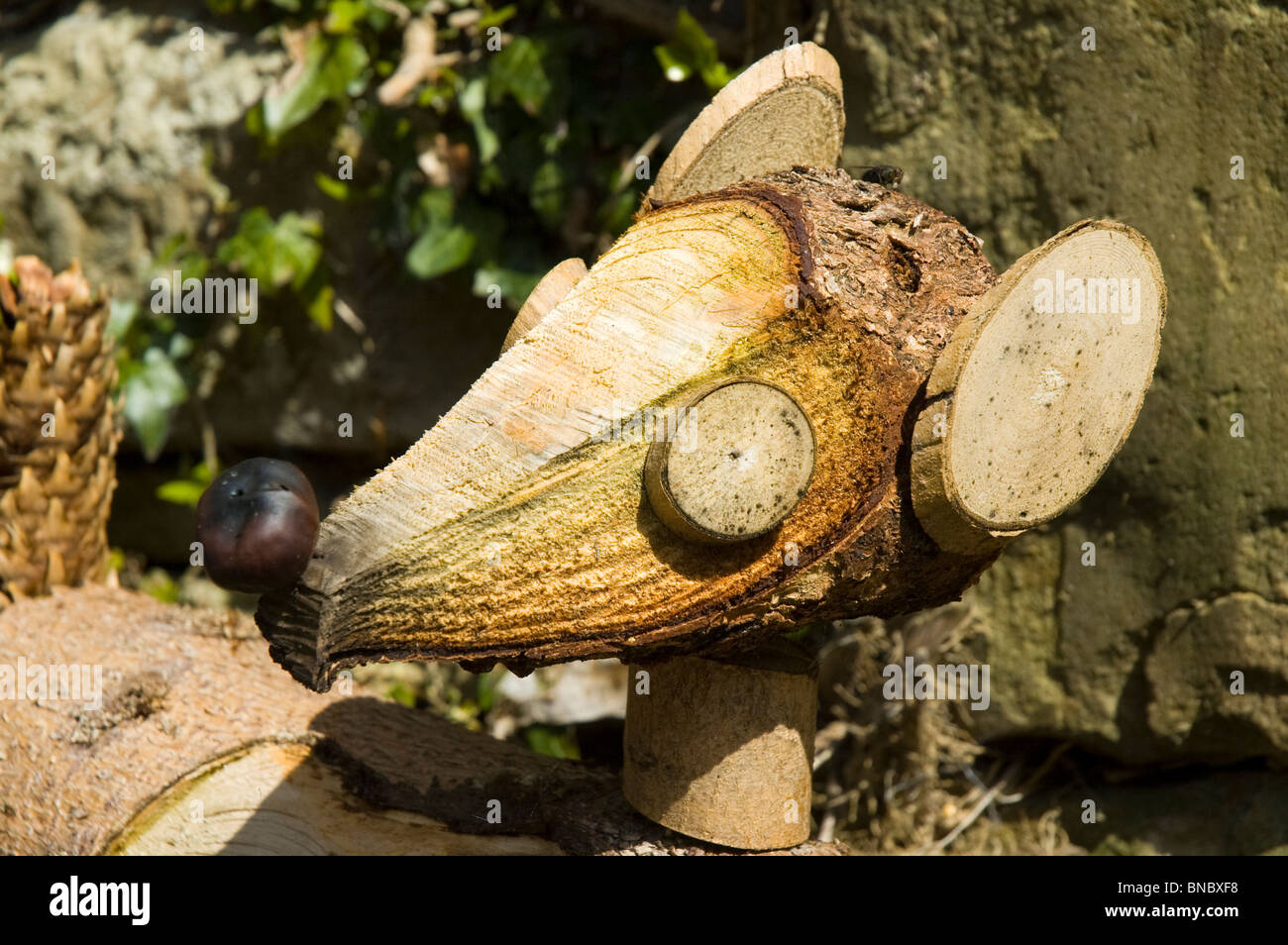 A dog carved from a log of wood in the village of Wray, near Lancaster ...