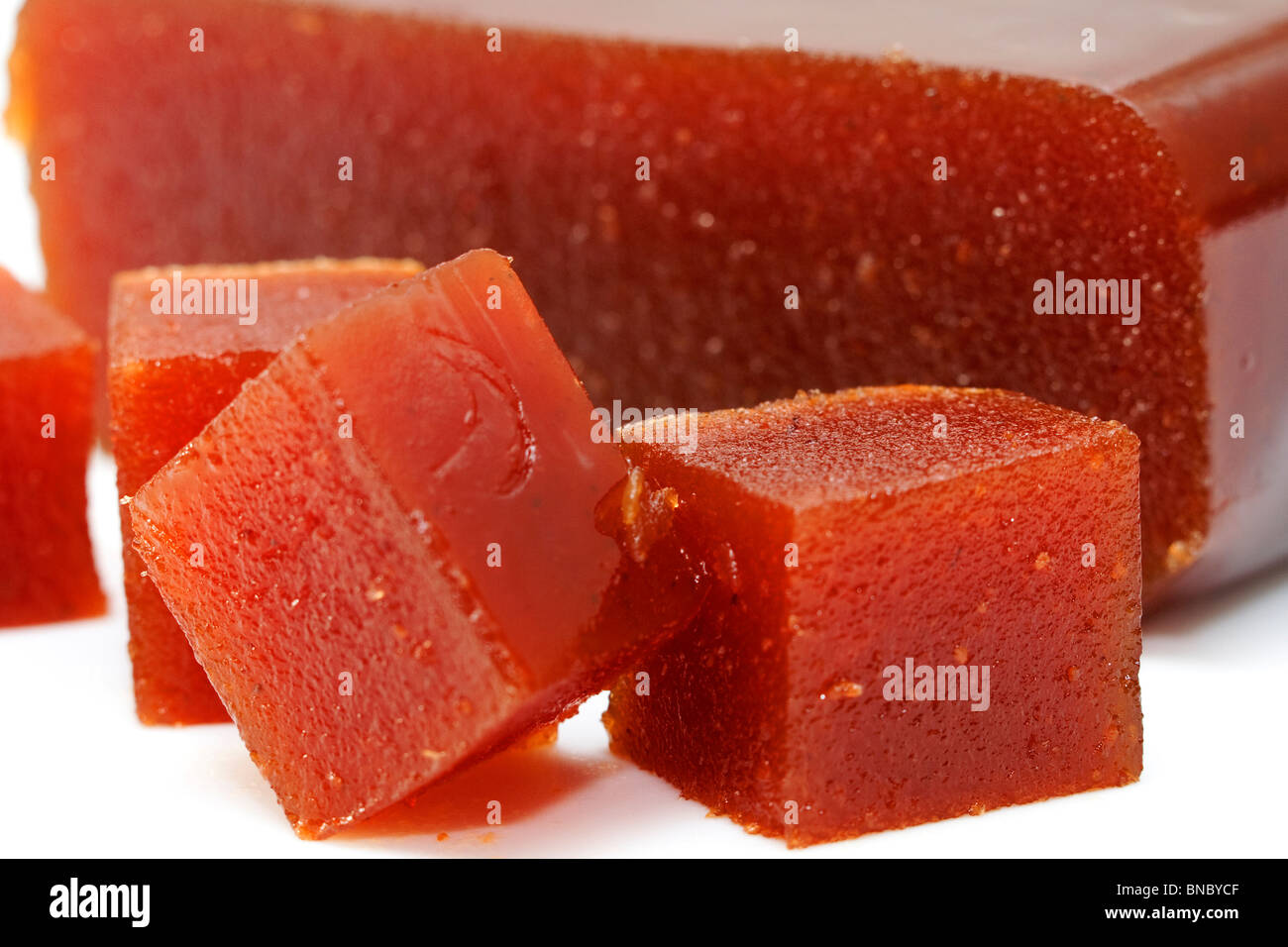 Sweet of quince over white background Stock Photo - Alamy