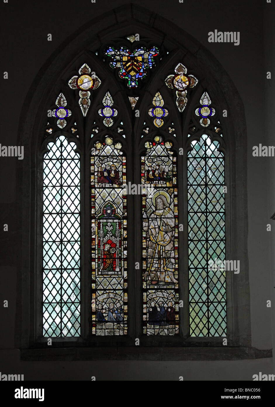 Medieval stained glass window with a depiction of St Alphege of ...