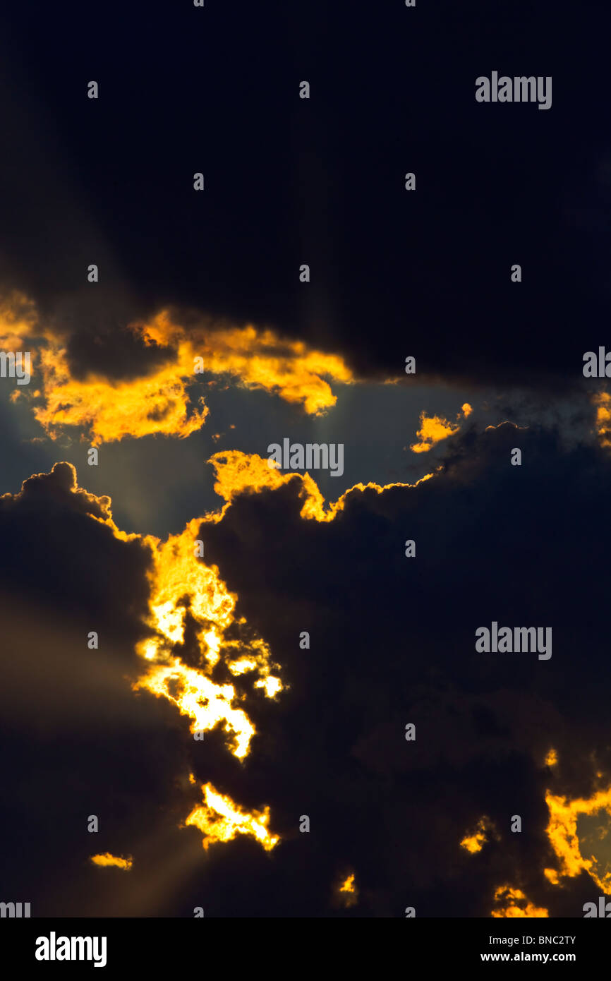 CREATIVE IMAGE OF SUN BREAKING THROUGH STORM CLOUDS WITH COPY SPACE ...