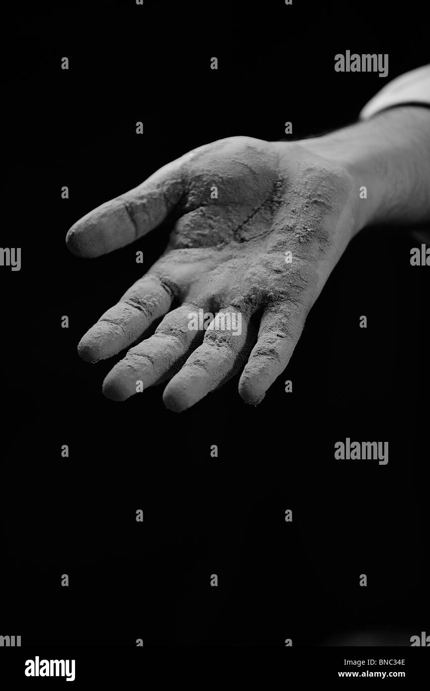 Open hand smeared with sand Stock Photo - Alamy