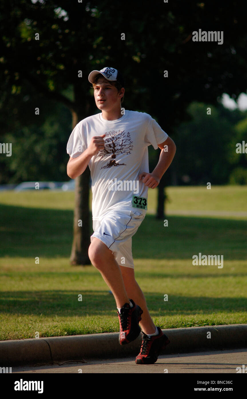 Male and female Marathon runners and joggers of all ages, shapes, sizes ...