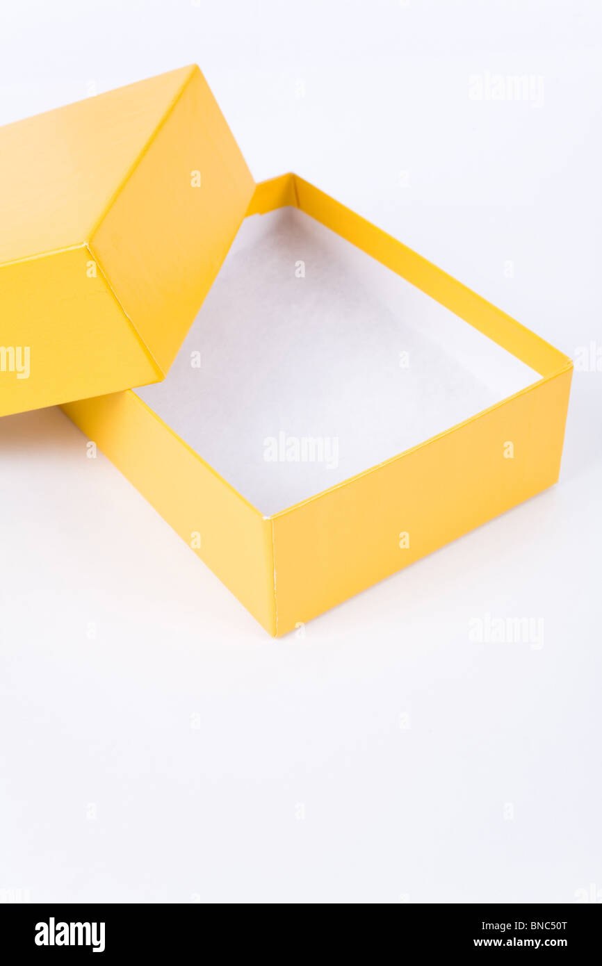 yellow Carton with white background Stock Photo - Alamy