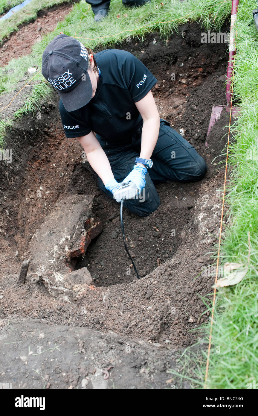 Forensic uniform hi-res stock photography and images - Alamy