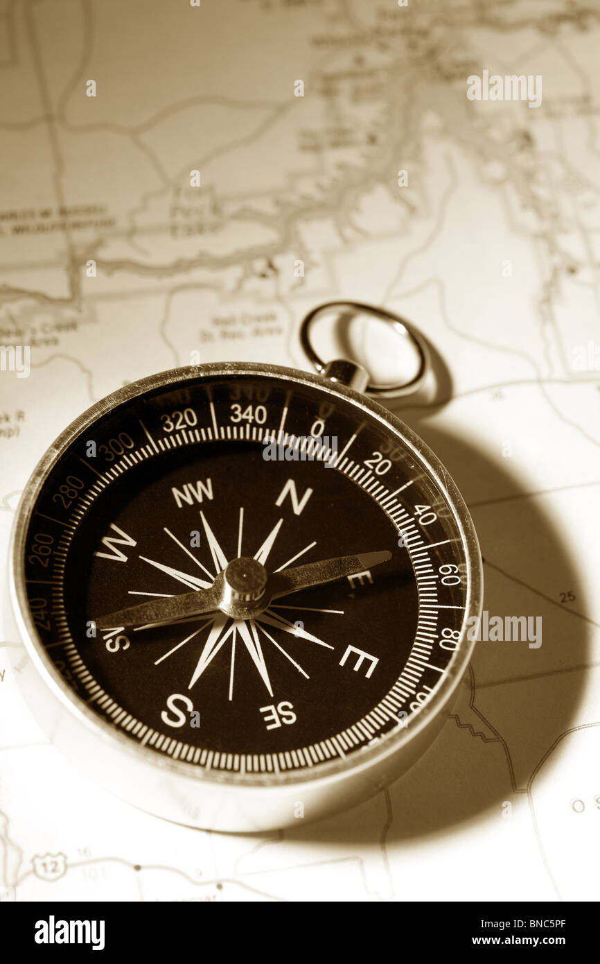 Compass and map close up shot Stock Photo - Alamy