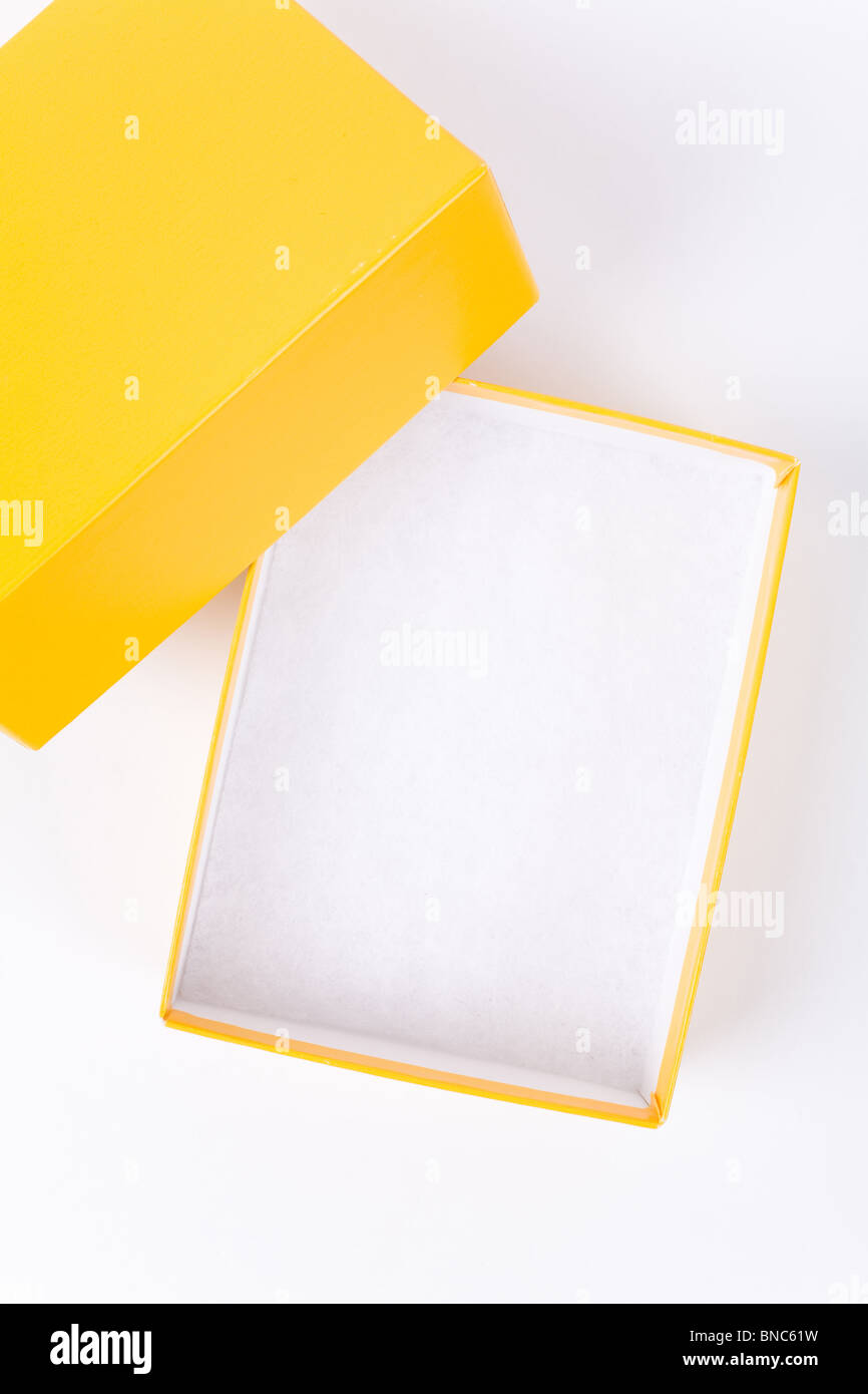 yellow Carton with white background Stock Photo - Alamy