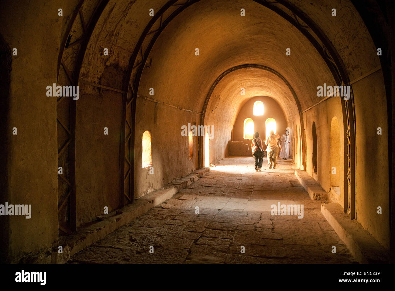 Tourists on a guided tour of the 7th century Coptic Monastery of St ...