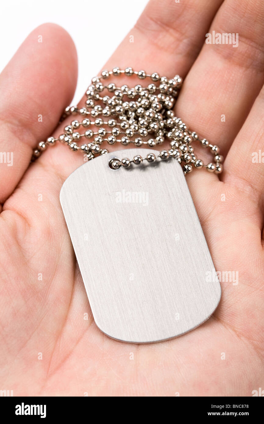 Identity tag with chain close up shot Stock Photo - Alamy