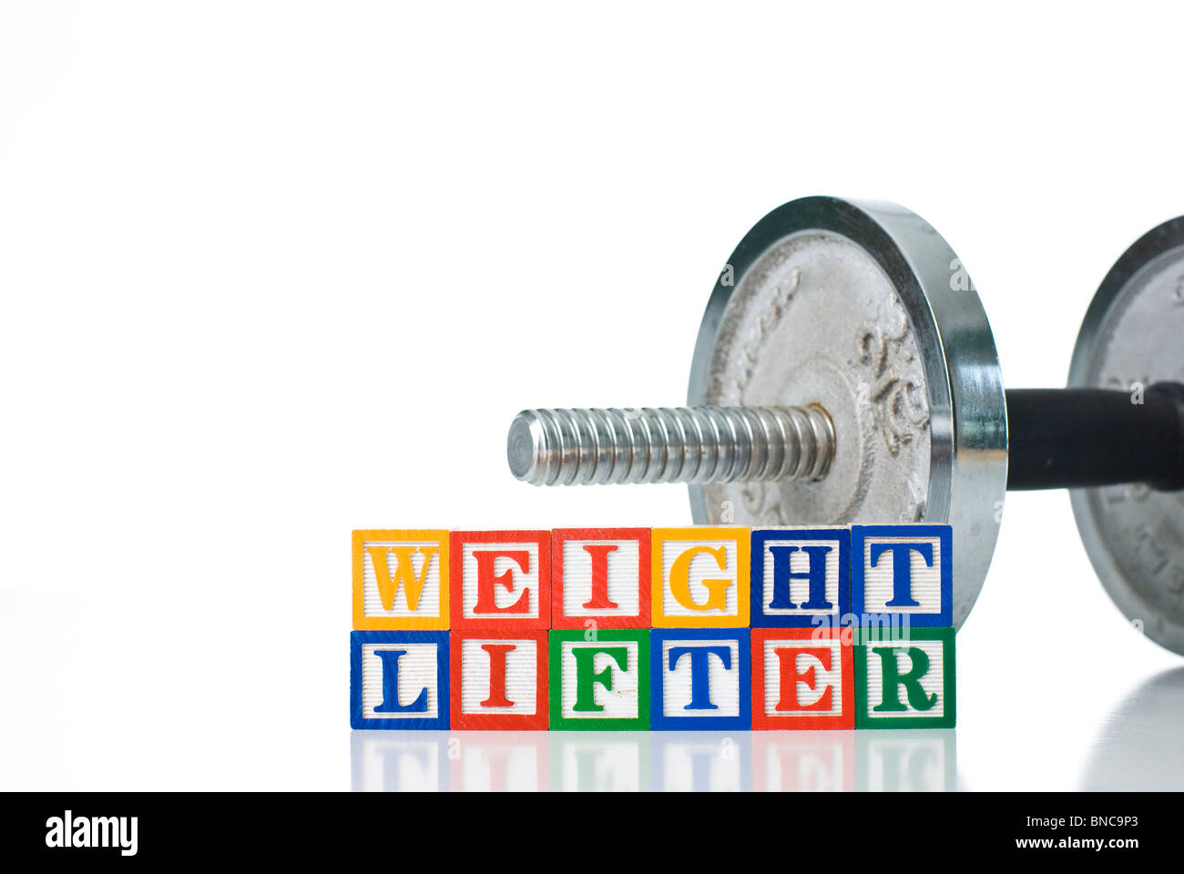Colorful children's blocks spelling WEIGHT LIFTER with dumbbell weights ...