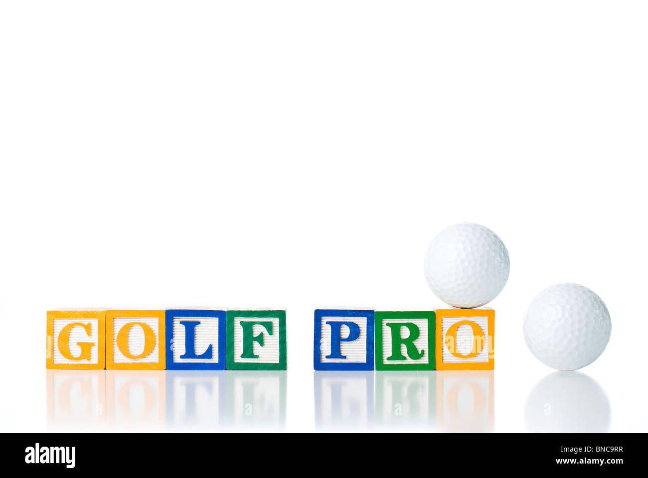 Colorful children's blocks spelling GOLF PRO with golf balls Stock ...