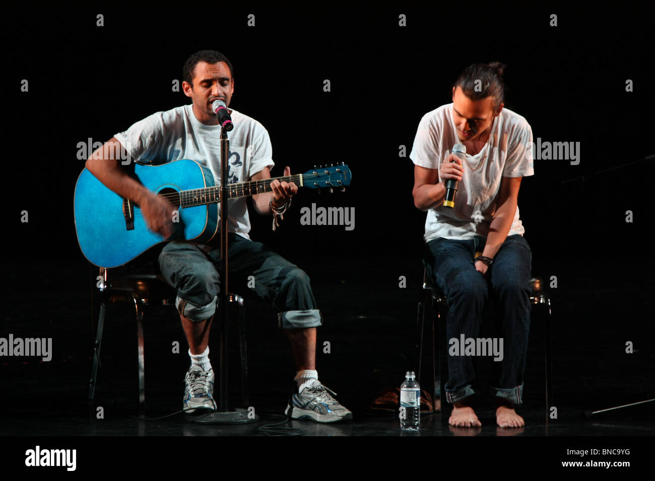 band male guitar guitarist singer microphone song Stock Photo - Alamy