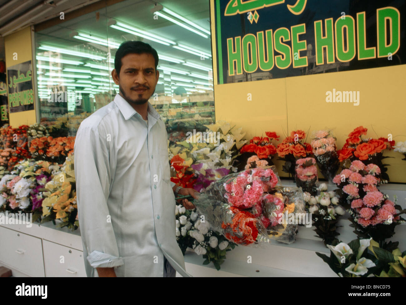 Dubai UAE Young Man Selling Flowers at Souk Stock Photo - Alamy