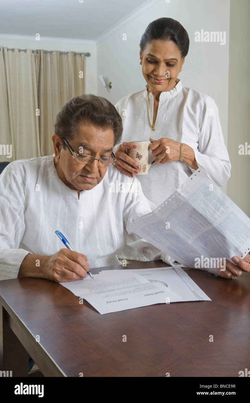 Woman sorting out clothing hi-res stock photography and images - Alamy