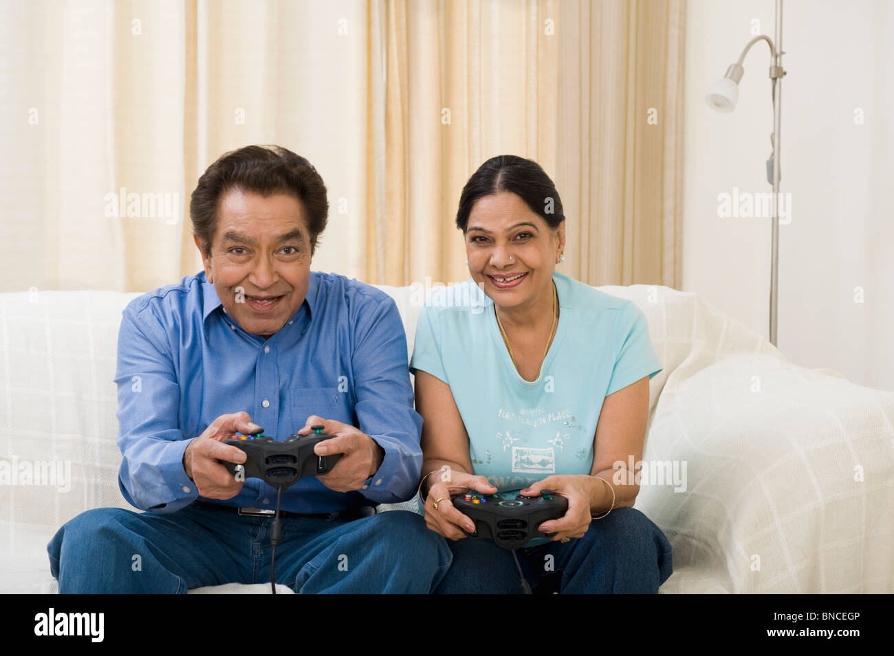 70s video game controller hi-res stock photography and images - Alamy