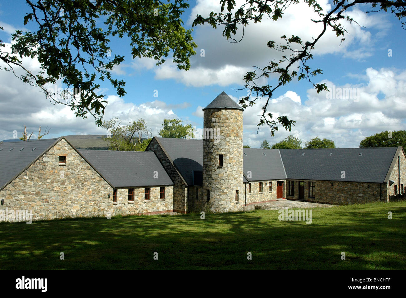The modern St Columba Centre with round tower Donegal Ireland Stock ...