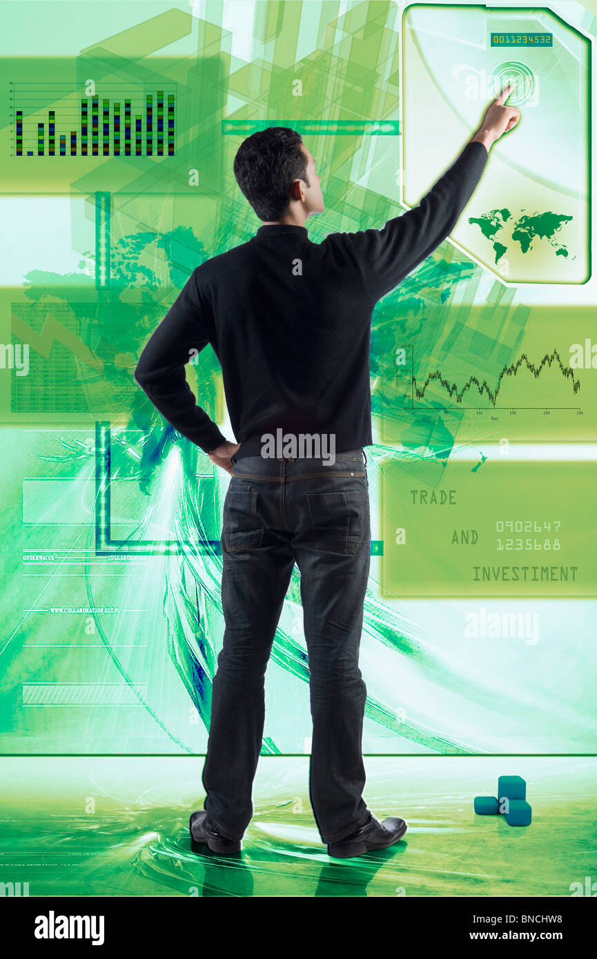 Man working on a futuristic touch screen Stock Photo - Alamy