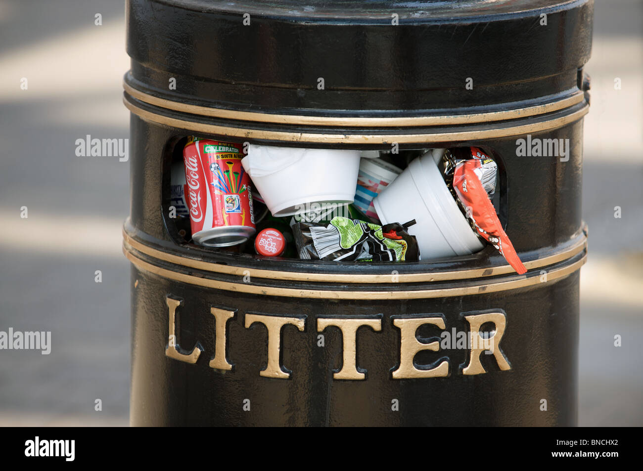 Full litter bin Stock Photo - Alamy
