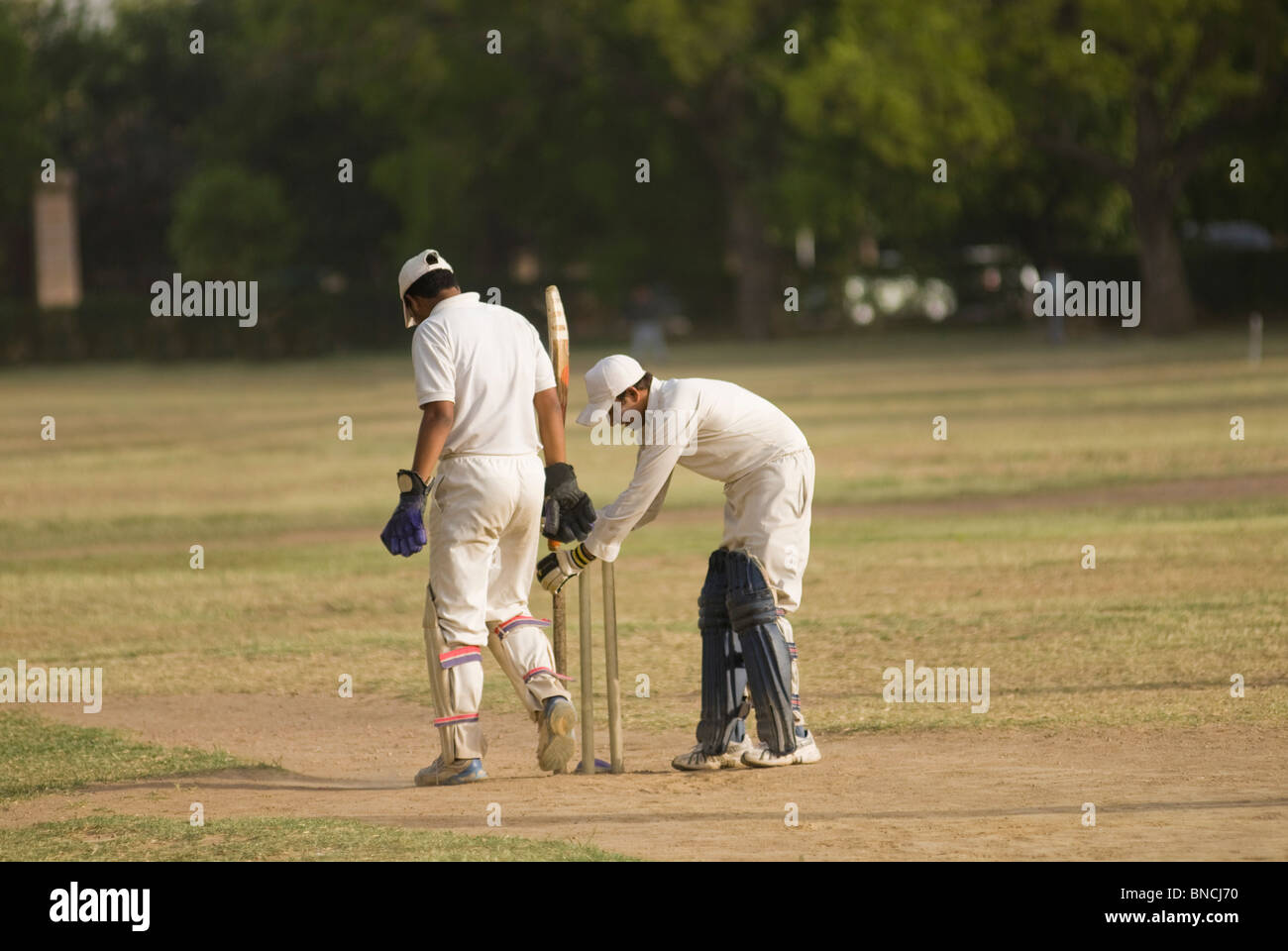 Cricket player full uniform hi-res stock photography and images - Alamy
