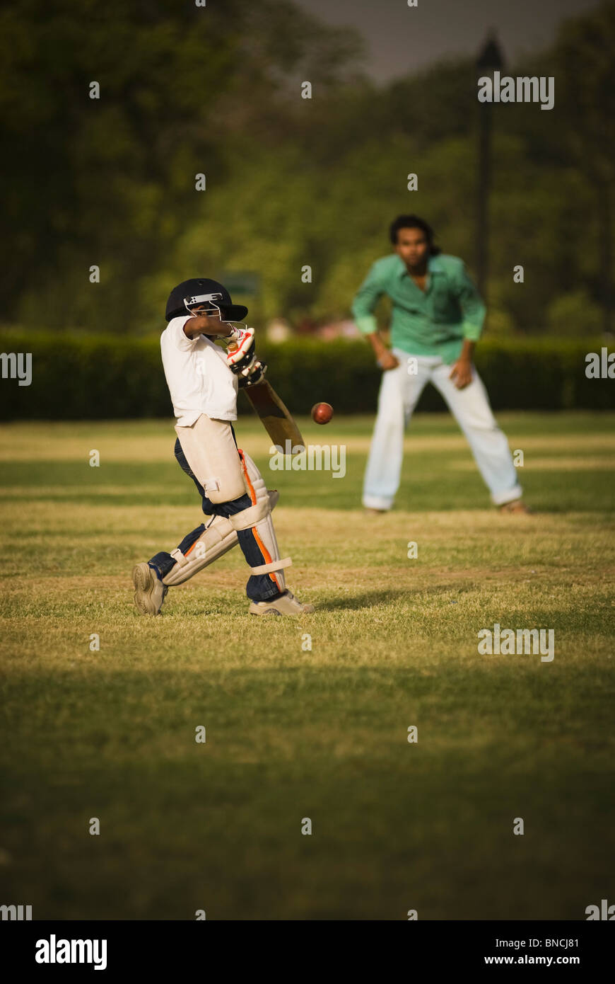 Cricket player full uniform hi-res stock photography and images - Alamy