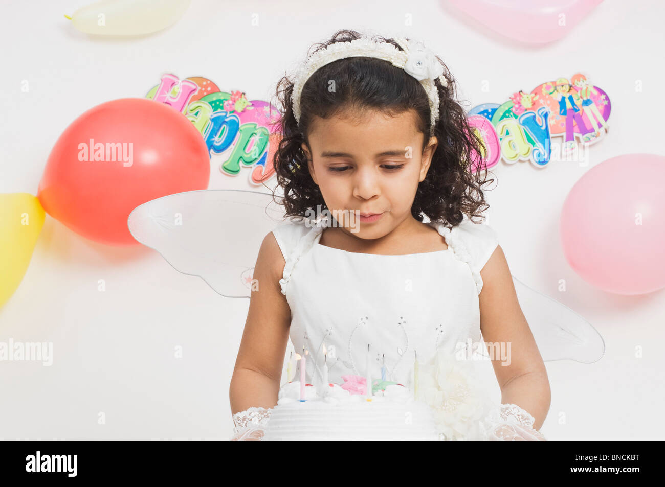 Tween girl and birthday cake hi-res stock photography and images - Alamy