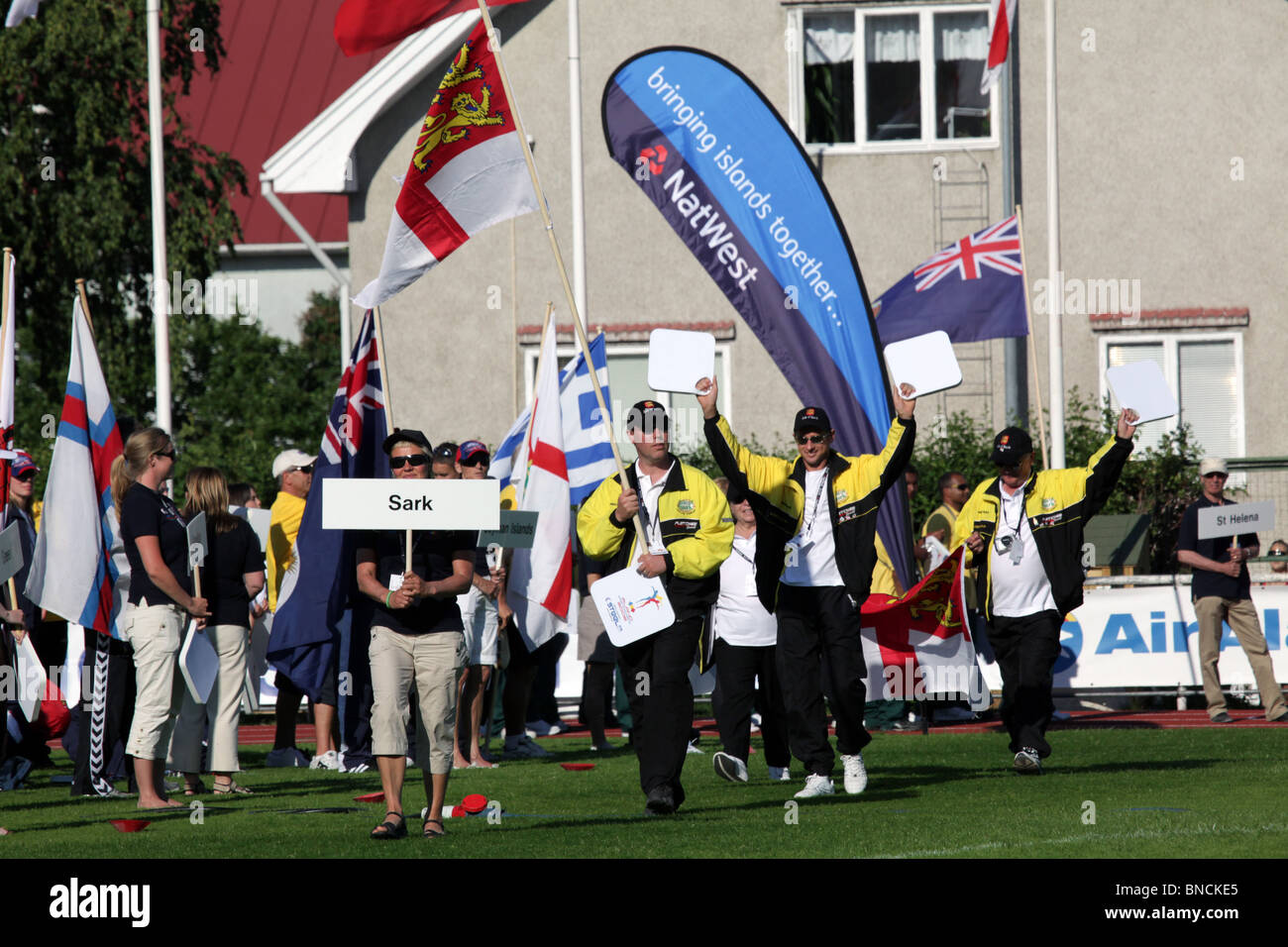 Flag bearer enter stadium hi-res stock photography and images - Alamy