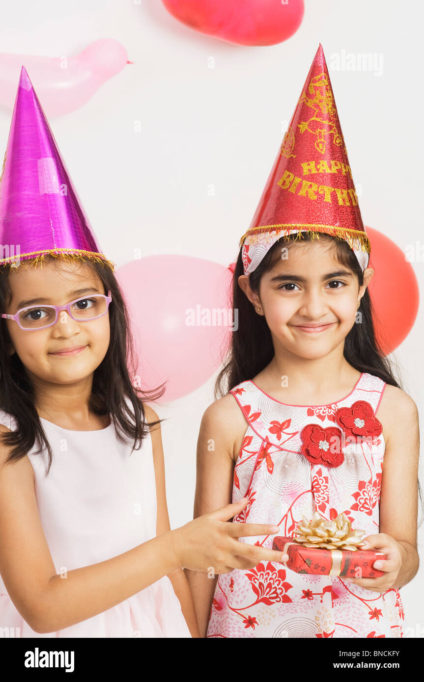 Two girls celebrating a birthday party Stock Photo - Alamy