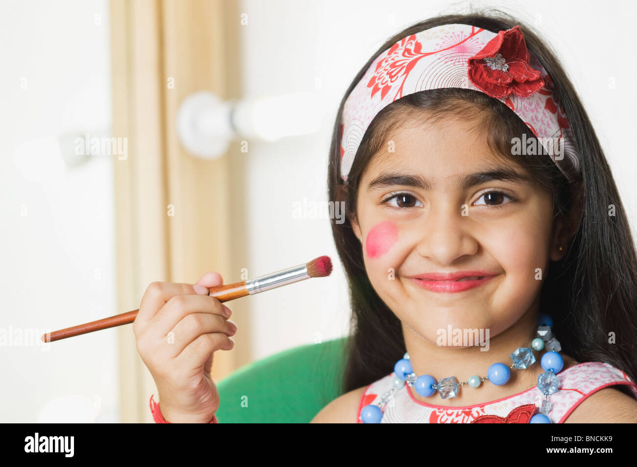 Portrait of a girl having make-up Stock Photo - Alamy