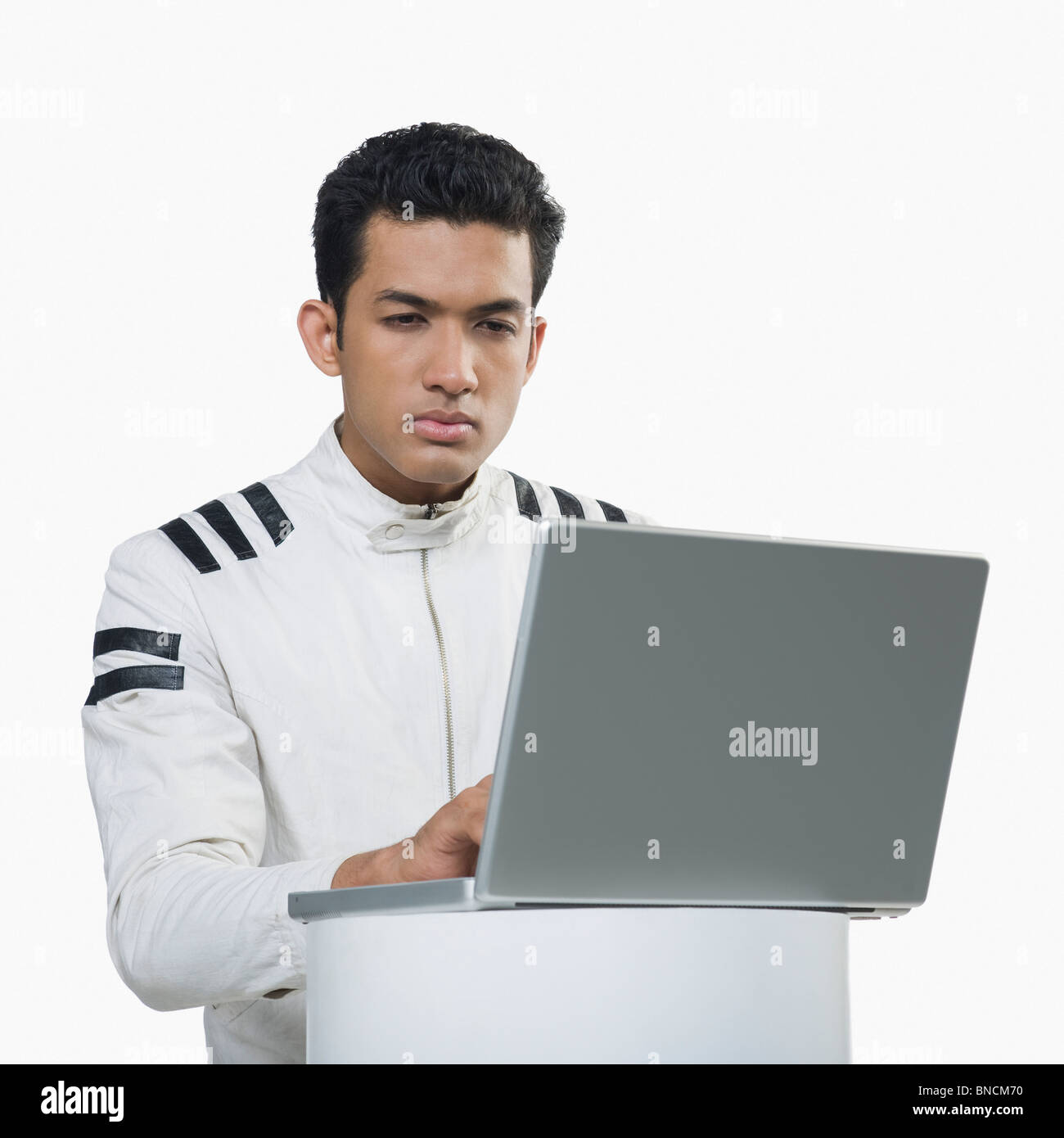 Pilot working on a laptop Stock Photo - Alamy