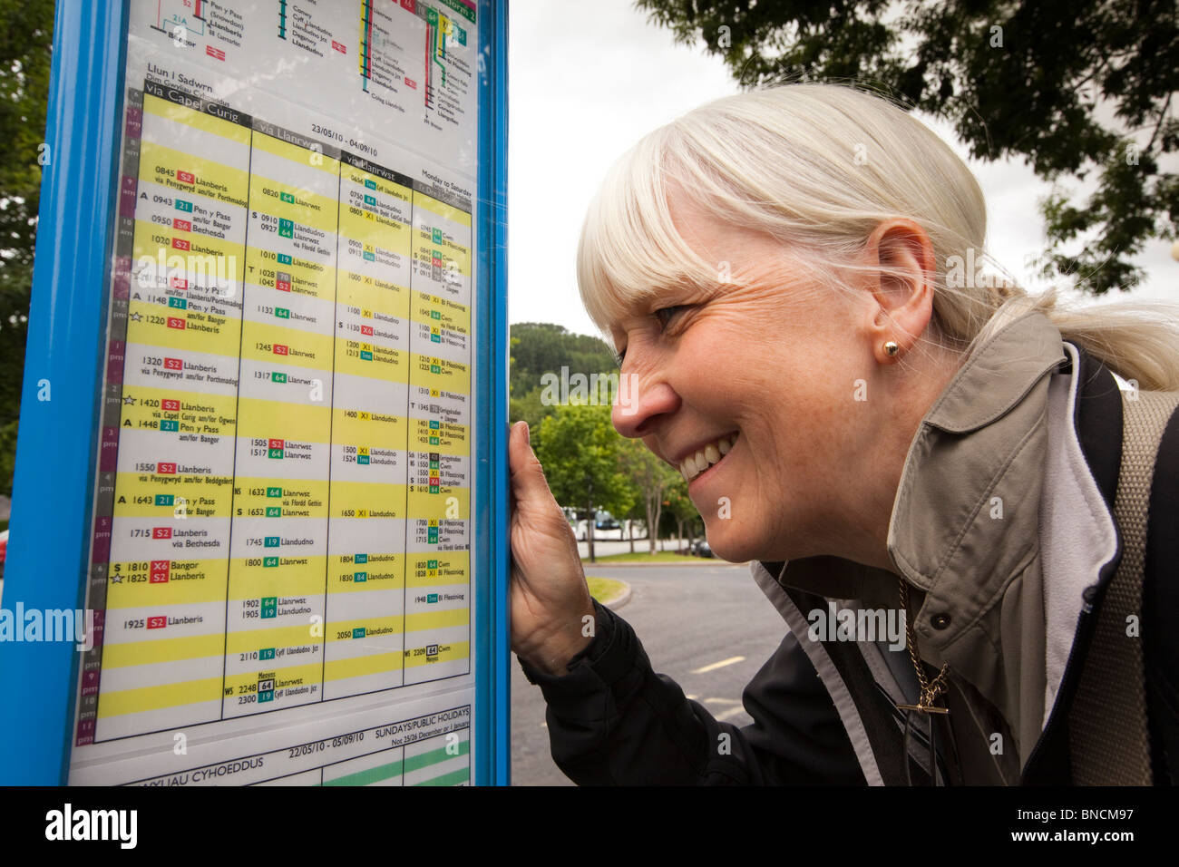 UK, Wales, Snowdonia, Betws y Coed, public transport passenger looking ...