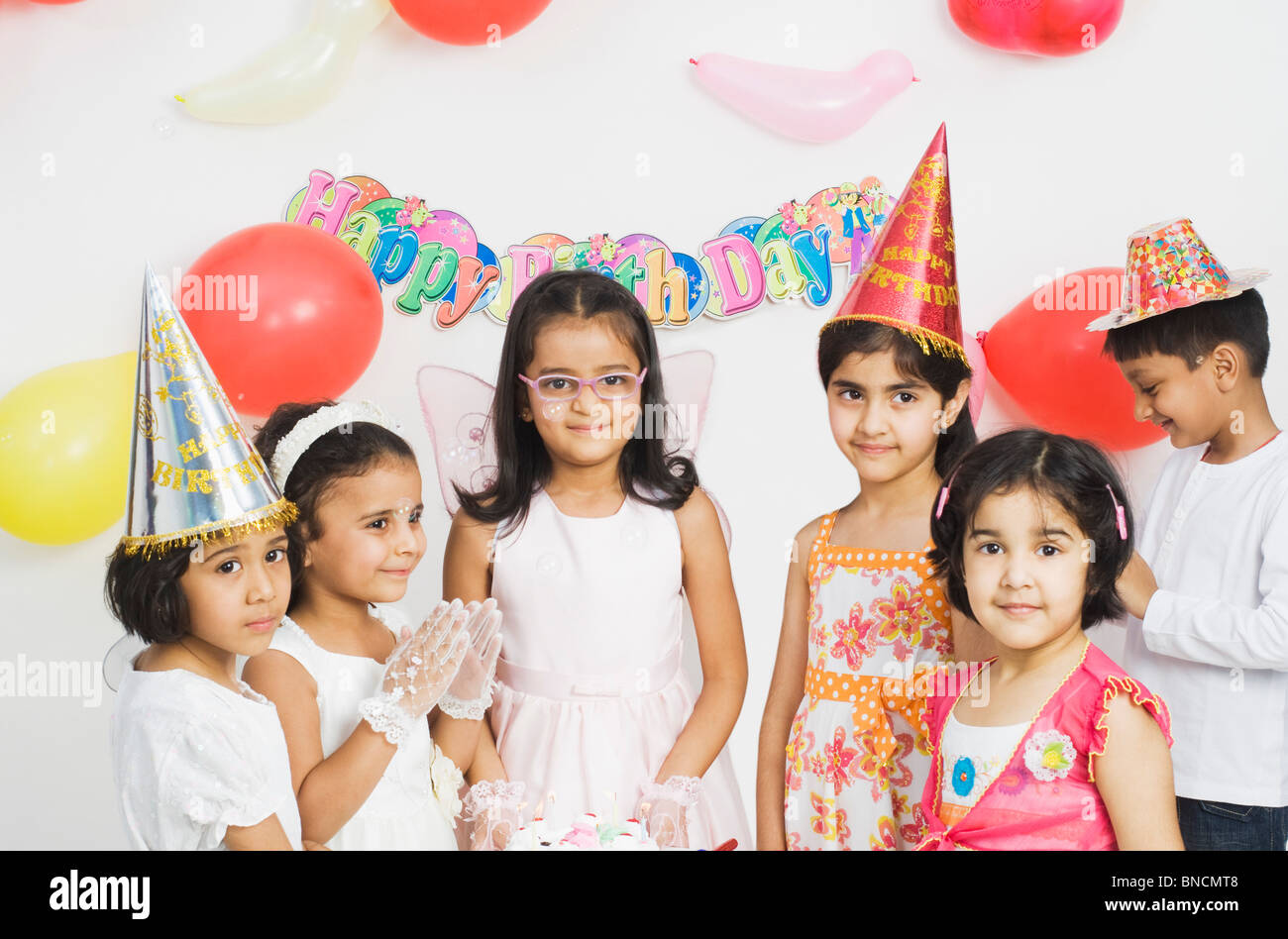 Children celebrating a birthday party Stock Photo - Alamy