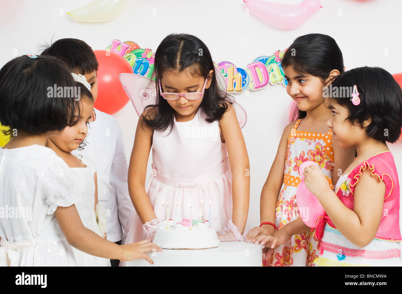 Children celebrating a birthday party Stock Photo - Alamy