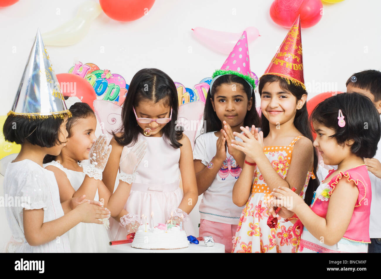 Children celebrating a birthday party Stock Photo - Alamy