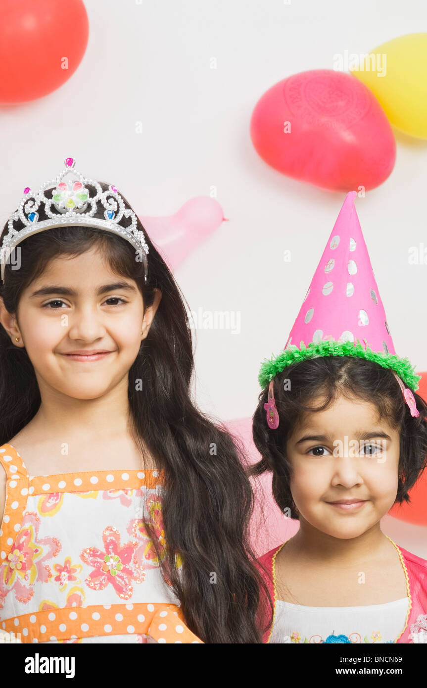 Portrait of two girls celebrating birthday Stock Photo - Alamy