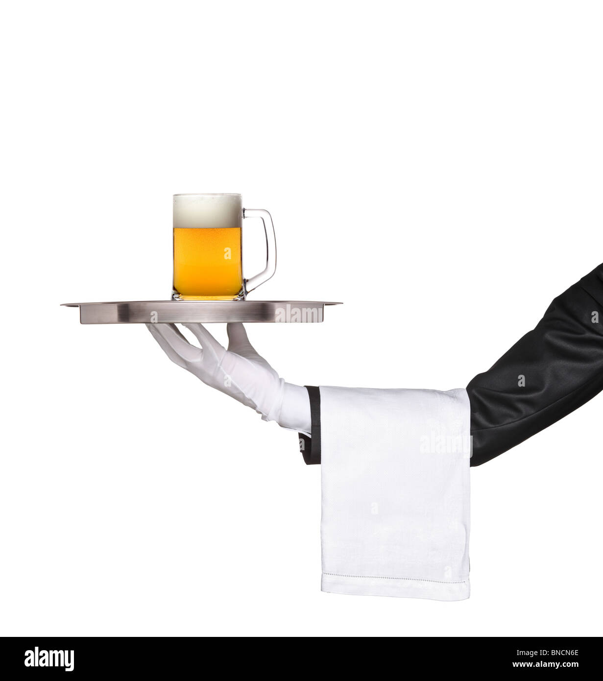 Butler holding a tray with a beer glass on it Stock Photo - Alamy